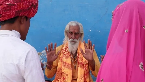 Indian holy man, Sadhu, hands raised and... | Stock Video | Pond5