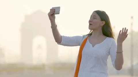 Indian influencer vlogging at India gate | Stock Video | Pond5