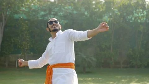 Indian man dancing openly in a park | Stock Video | Pond5