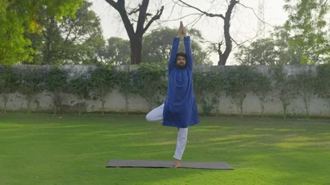 Indian man doing Surya Namaskar | Stock Video | Pond5