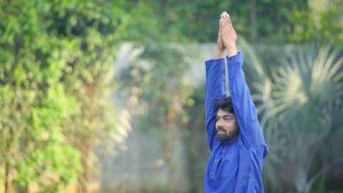 Indian man doing Surya Namaskar | Stock Video | Pond5
