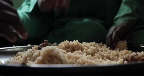 Indian man eating traditional rice with ... | Stock Video | Pond5