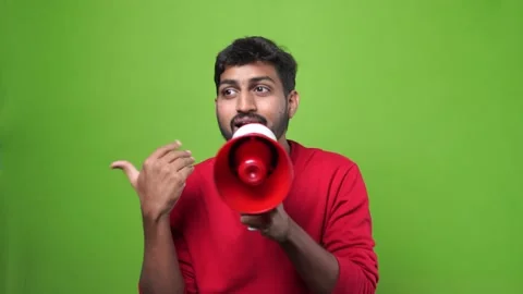 Indian man shouting with a megaphone ove... | Stock Video | Pond5