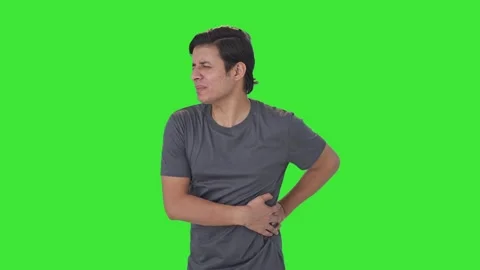 Indian man suffering from back pain Gree... | Stock Video | Pond5