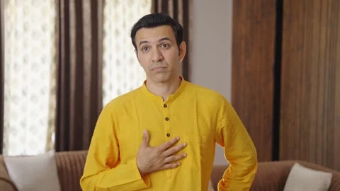 Indian man suffering from gas problem | Stock Video | Pond5