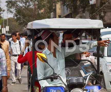 Indian Motor rickshaws and their passengers ~ Premium Photo #161723264