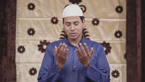Indian muslim man praying to Allah and r... | Stock Video | Pond5