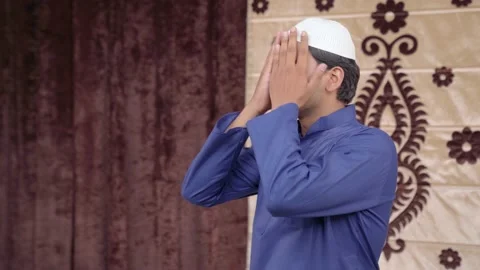 Indian muslim man praying to Allah and r... | Stock Video | Pond5