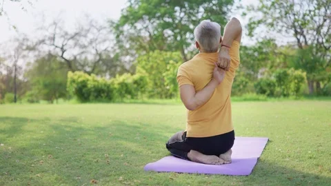 Indian old Man performing Yoga asanas in... | Stock Video | Pond5