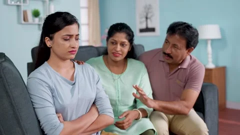 Indian parents consoling to sad or angry... | Stock Video | Pond5