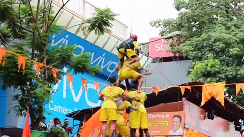 Indian people making human pyramid in Da... | Stock Video | Pond5