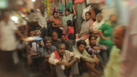Indian people sitting in group at roadsi... | Stock Video | Pond5