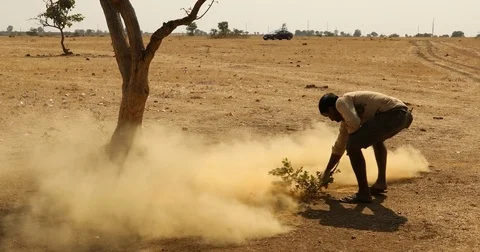 Indian People working in desert | Stock Video | Pond5