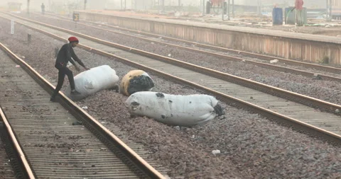 Indian People Working at Train Track | Stock Video | Pond5
