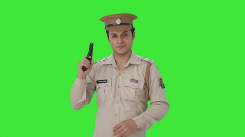 Indian police officer posing with gun Gr... | Stock Video | Pond5