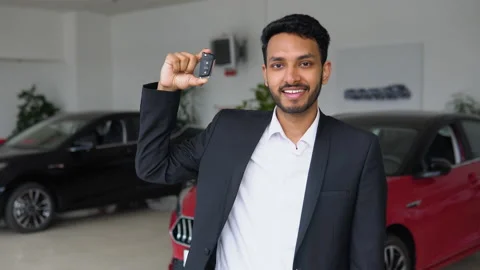 Indian salesman standing at dealership n... | Stock Video | Pond5