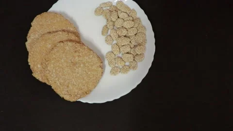 indian traditional sweet tilkut in white... | Stock Video | Pond5