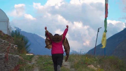Indian woman raising her arms in front o... | Stock Video | Pond5