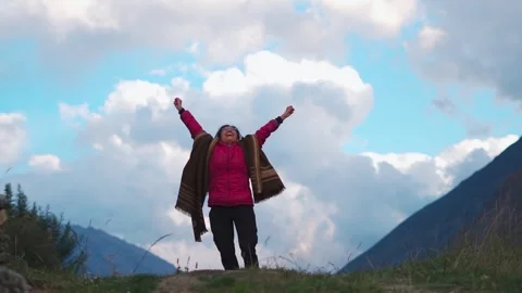 Indian woman raising her arms in front o... | Stock Video | Pond5