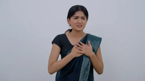 Indian Woman in Saree having Chest Pain,... | Stock Video | Pond5