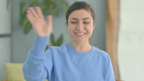 Indian Woman Waving Hand to Say Hello | Stock Video | Pond5