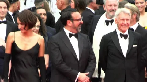 The Indiana Jones team walks the red car... | Stock Video | Pond5