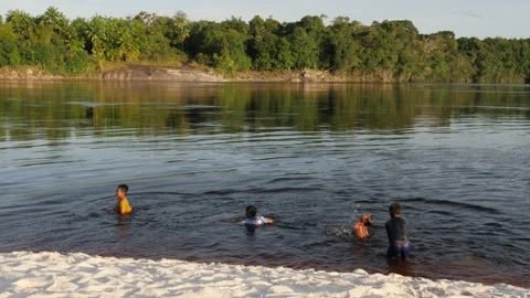 Indigenous Children Playing Fun Swimming... | Stock Video | Pond5