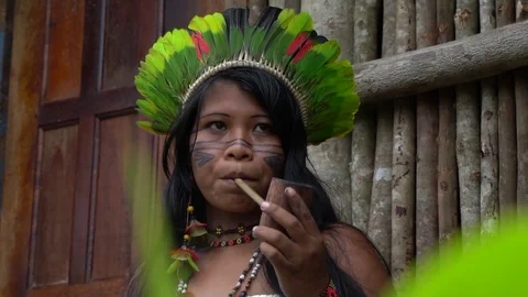 Indigenous Woman Smoking Pipes in a Trib... | Stock Video | Pond5