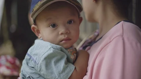 Indonesian baby face | Indonesia Traditi... | Stock Video | Pond5