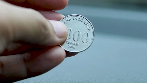 indonesian one thousand coin rupiah - 10... | Stock Video | Pond5