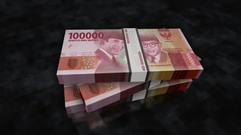 Indonesian Rupiah money banknote pile pa... | Stock Video | Pond5