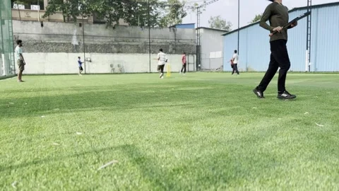 indoor cricket on turf india 4k | Stock Video | Pond5