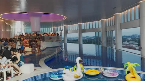 Indoor pool party in a hotel | Stock Video | Pond5