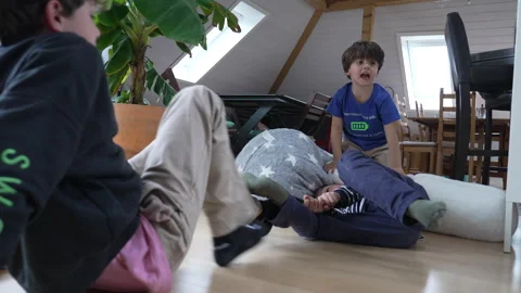 Indoor Sibling Clash scene of Brothers W... | Stock Video | Pond5