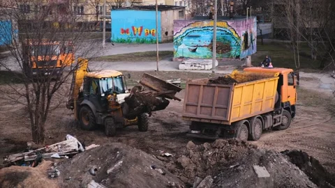 Industrial excavator JCB load a garbage ... | Stock Video | Pond5