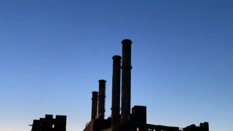 Industrial factory chimney stacks on Hud... | Stock Video | Pond5