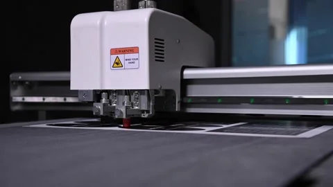 industrial plotter cuts a template on a ... | Stock Video | Pond5