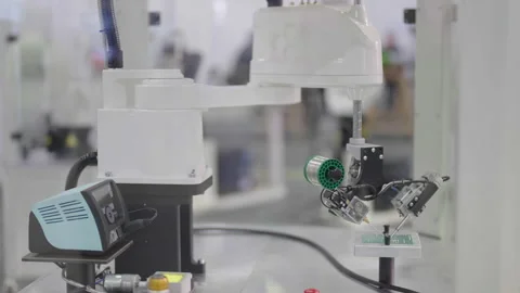 Industrial robot inside the closed windo... | Stock Video | Pond5