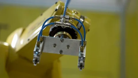 Industrial robot manipulator yellow colo... | Stock Video | Pond5