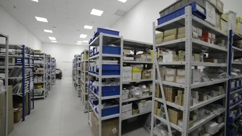 Industrial warehouse. White metal racks ... | Stock Video | Pond5