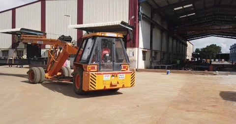 Industrial workers moving metal beams us... | Stock Video | Pond5