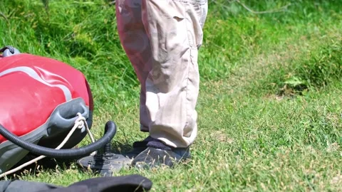 An inflatable boat is pumped up with a p... | Stock Video | Pond5