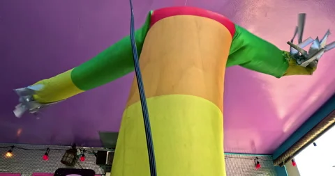 Inflatable fan blowing balloon dancing t... | Stock Video | Pond5