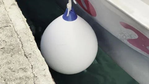 Inflatable white signal buoy hangs on si... | Stock Video | Pond5