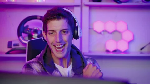 Influencer male gamer playing games with... | Stock Video | Pond5