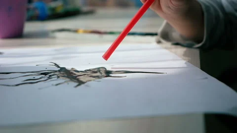 Ink drawing by blowing into a drinking s... | Stock Video | Pond5