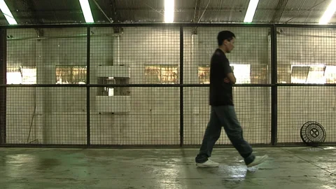 Inmate Walking Along a Corridor inside O... | Stock Video | Pond5
