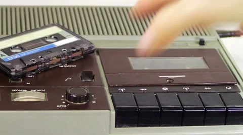 Insert Audio Cassette into the Tape Play... | Stock Video | Pond5