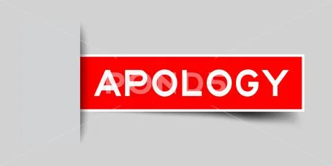 Inserted red color label sticker with word apology on gray background ...