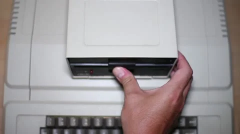 Inserting Removing Old Floppy Disk Drive | Stock Video | Pond5